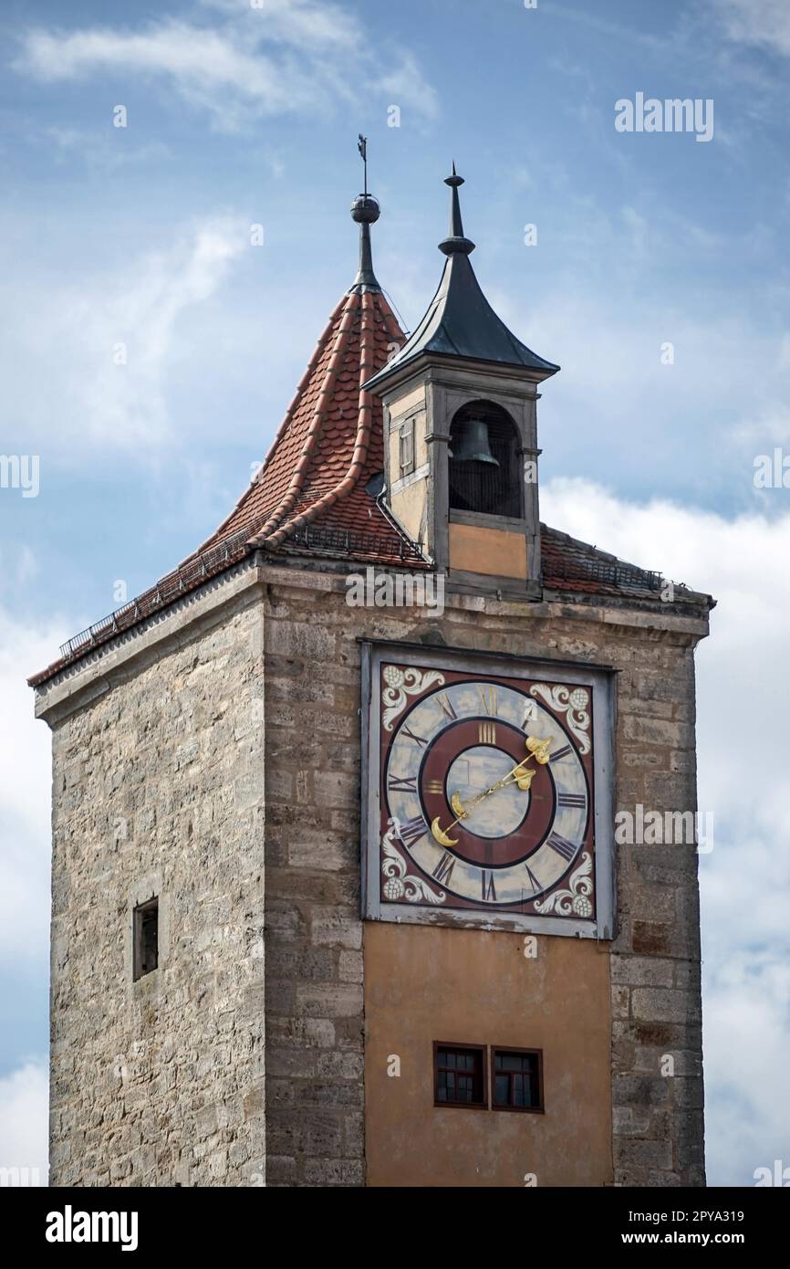 Unusual clock tower in Rothenburg Stock Photo - Alamy