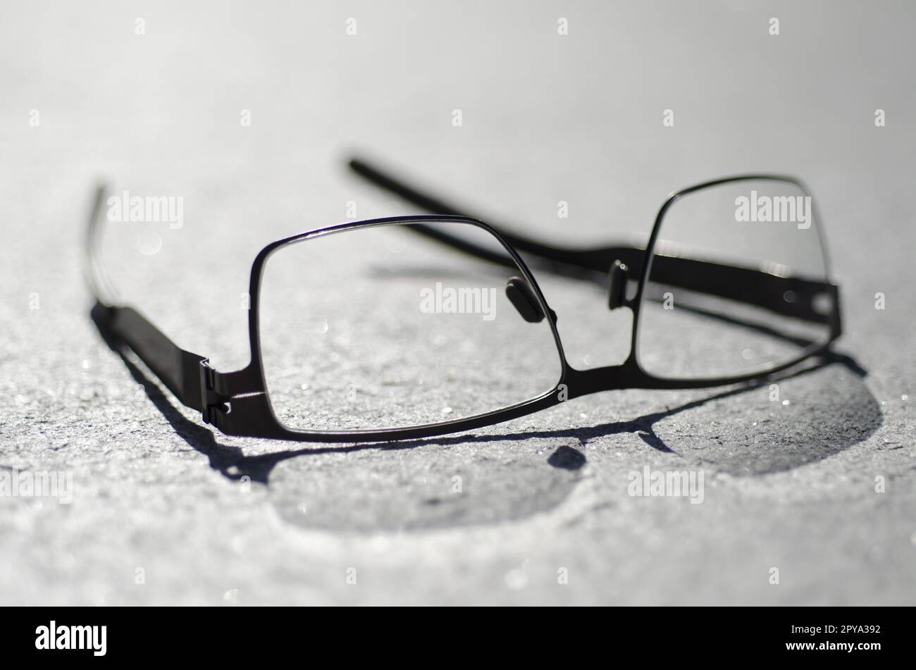 Eyeglasses with Shadow Stock Photo - Alamy