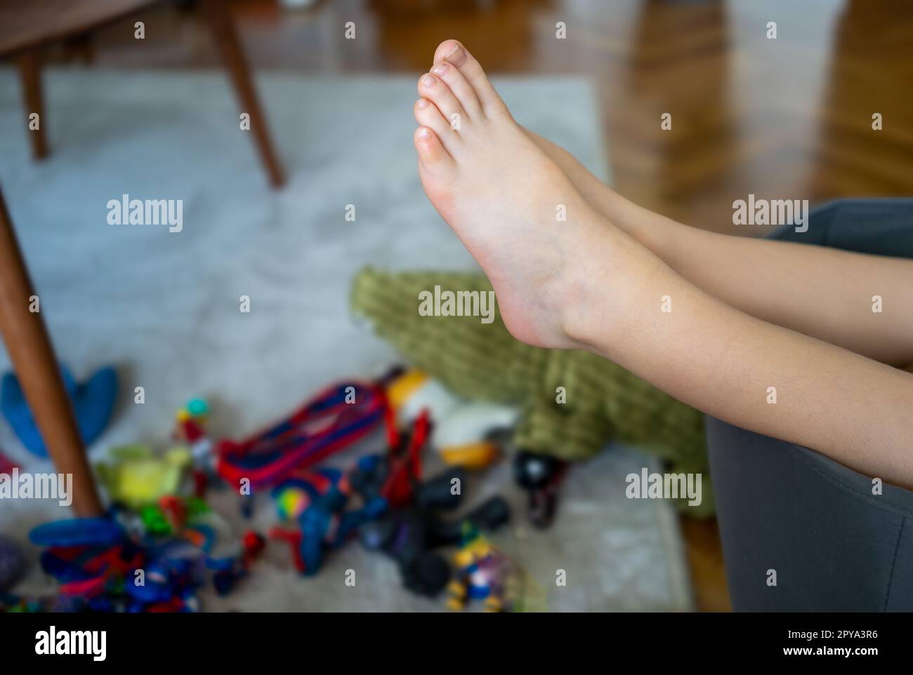 the feet of a small child in a box, the heels of a baby close-up ...