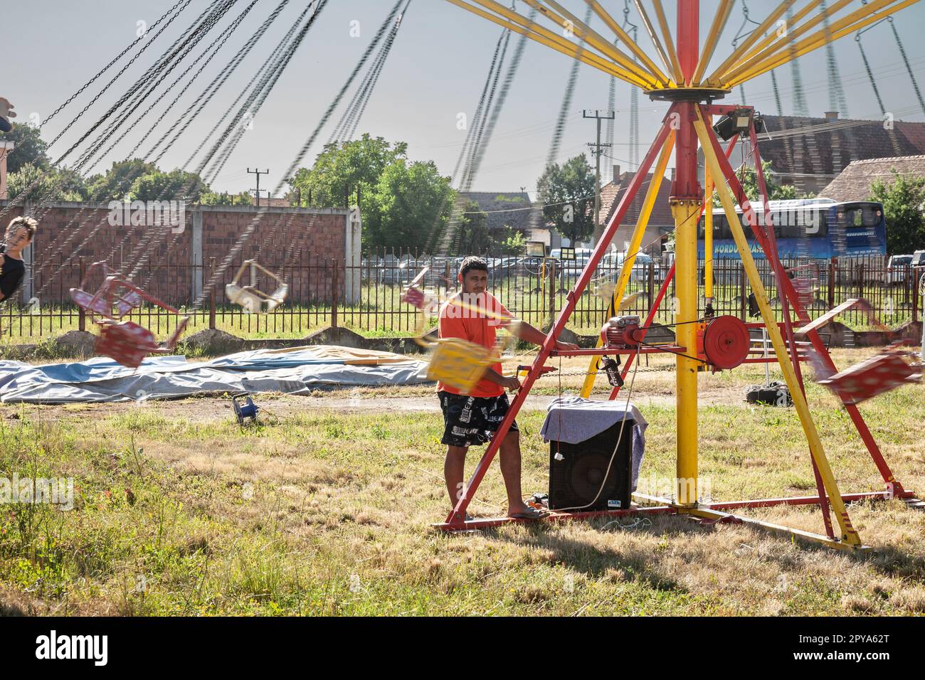 Picture of a swing ride rotating during a carnival in an amusement park ...