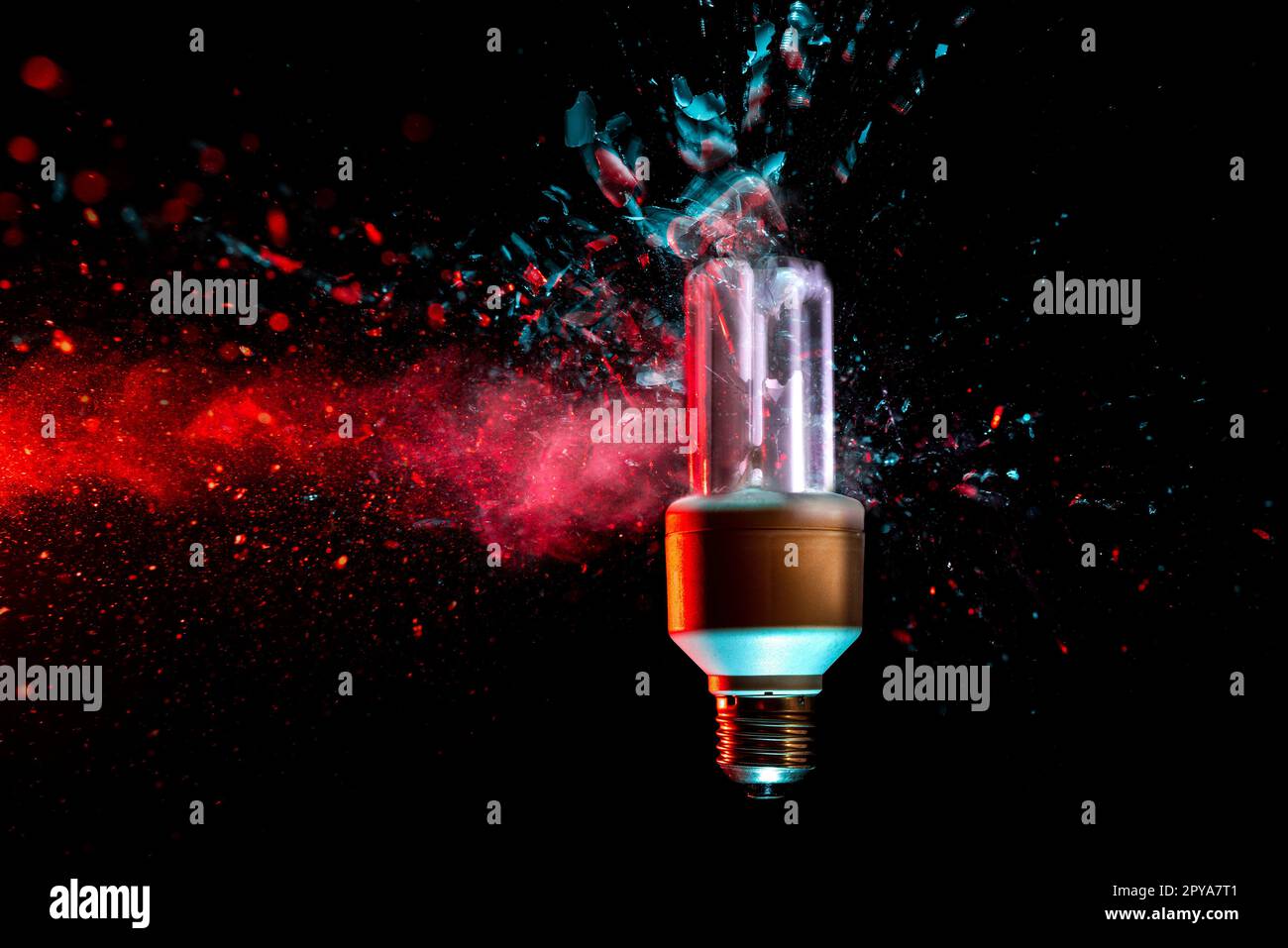explosion of a low energy light bulb. black background Stock Photo - Alamy