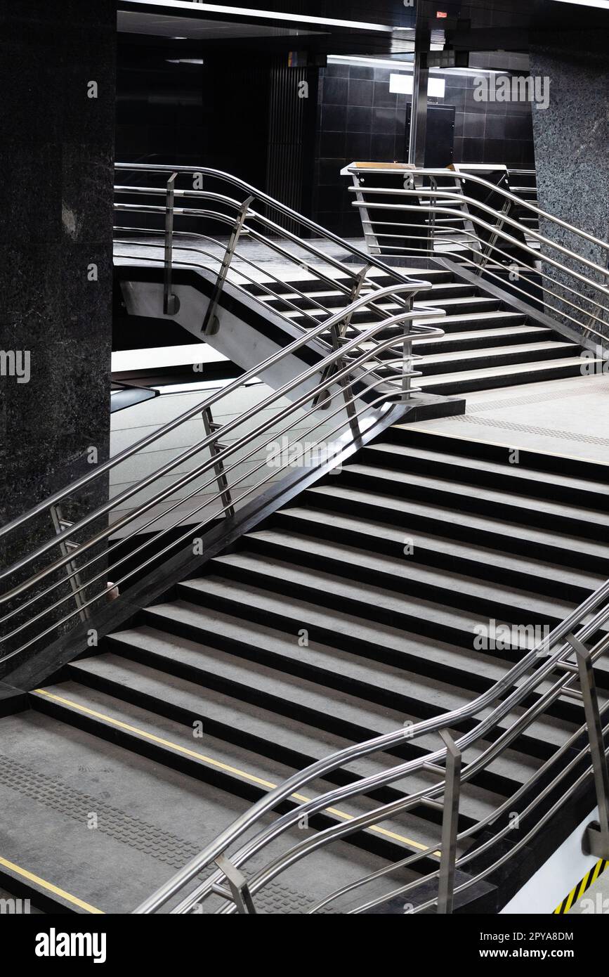 stairs with steel railings in underground passage Stock Photo - Alamy