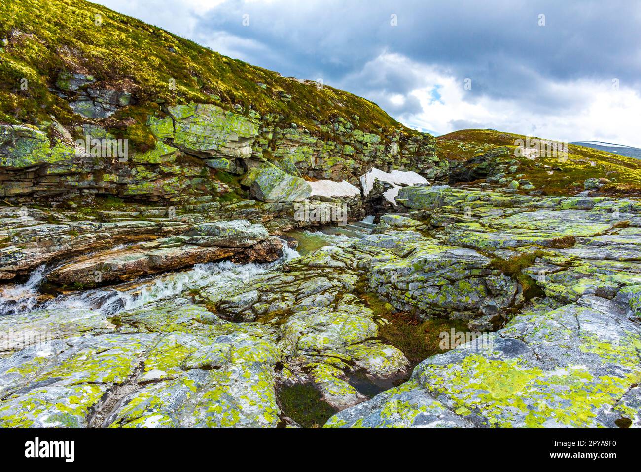 Gorge rocks cliff and waterfall river Rondane National Park Norway ...