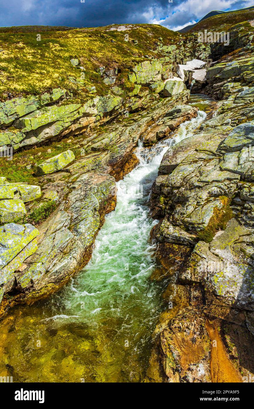 Gorge rocks cliff and waterfall river Rondane National Park Norway ...