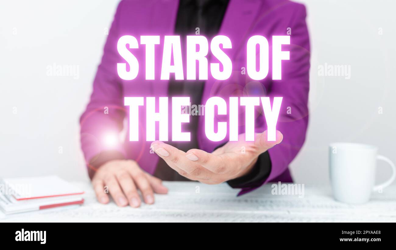 Hand writing sign Stars Of The City. Word Written on sparkling night ...