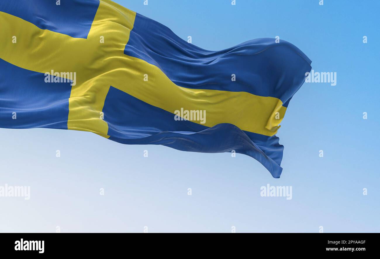 The national flag of Sweden waving on a clear day Stock Photo - Alamy