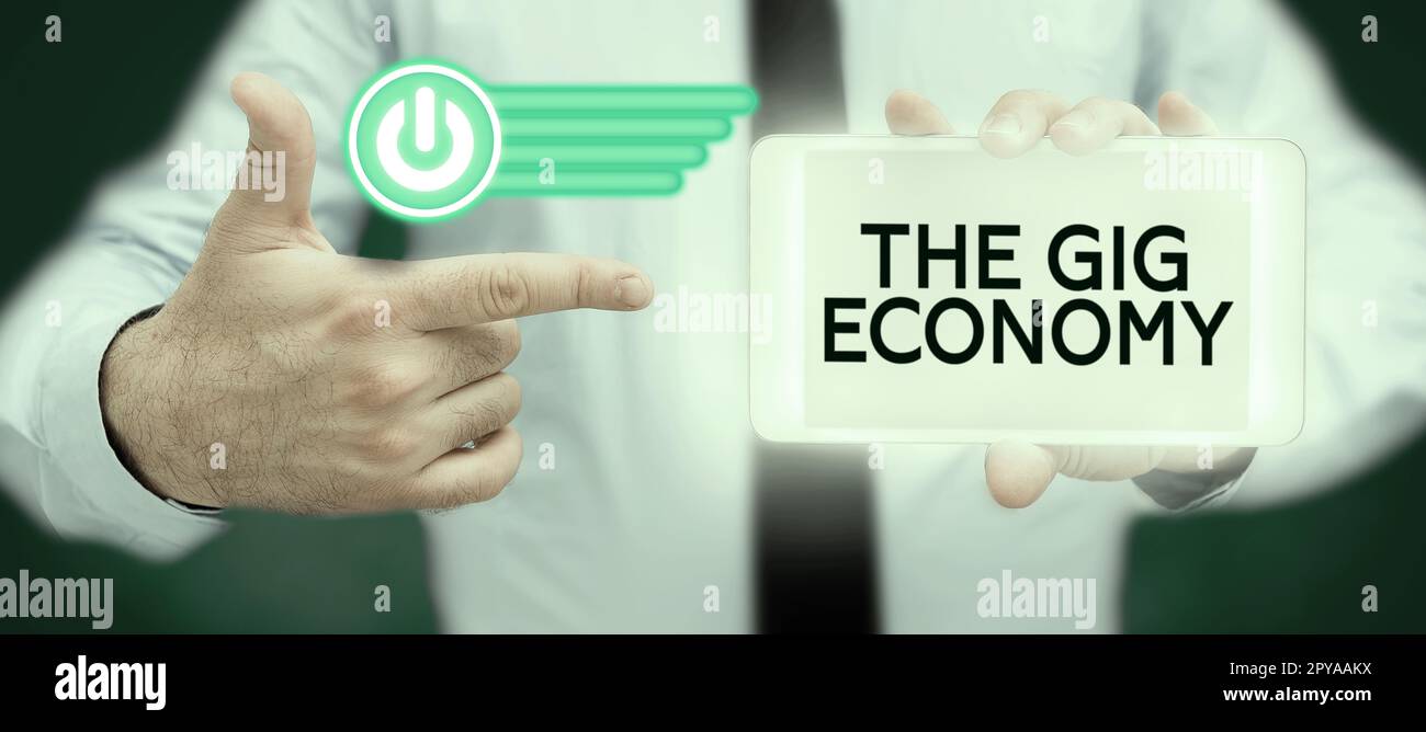 Hand writing sign The Gig Economy. Concept meaning Market of Short-term ...