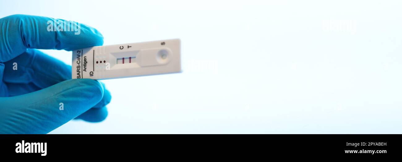 Positive test result by using rapid test device for COVID-19 Stock ...