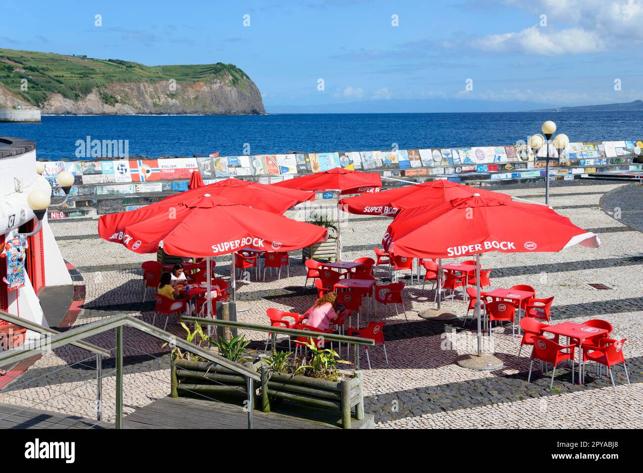 Snack bar and painted wall at the harbour, Horta, Faial, Azores ...