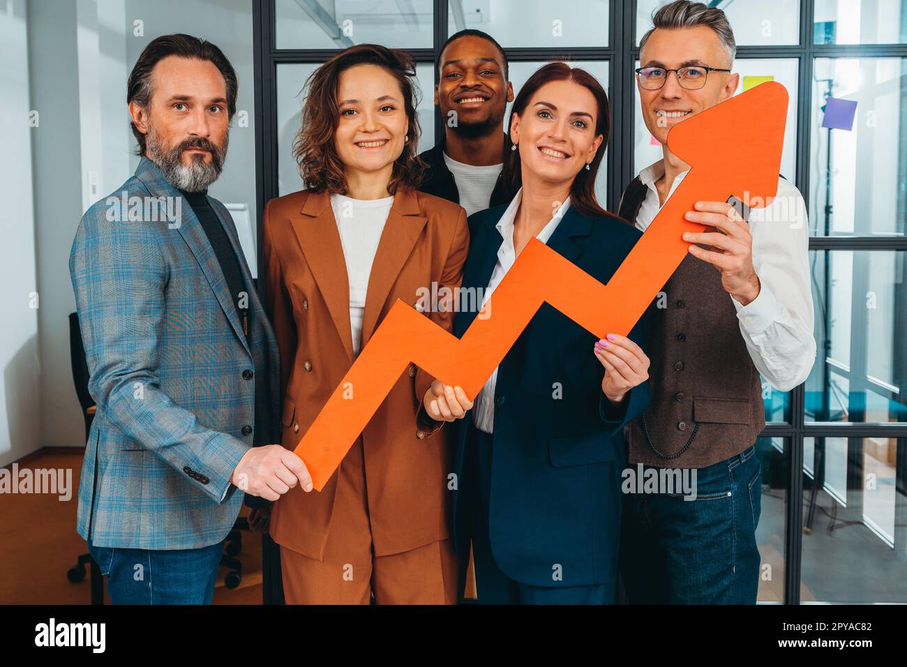 Business team hold a statistical arrow. concept of growing, successful ...