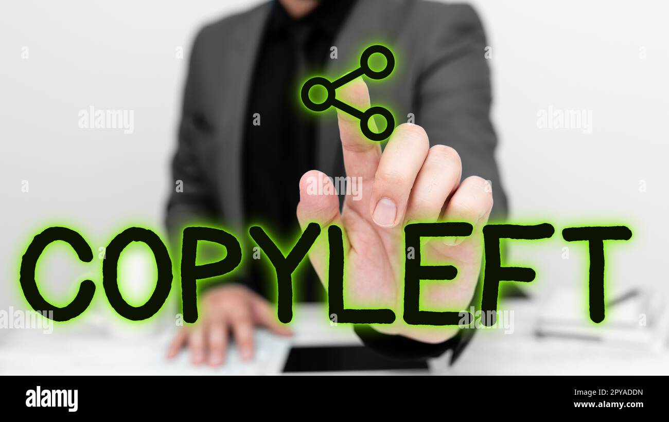 Hand writing sign Copyleft. Word Written on the right to freely use ...