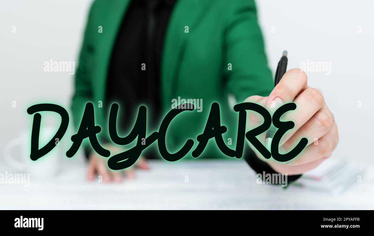 Sign displaying Daycare. Word for offering care to preschool children ...