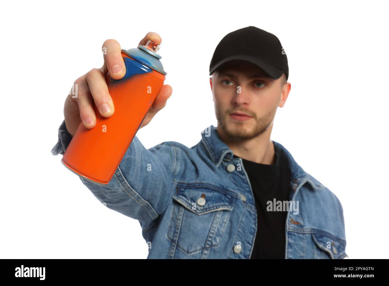 Handsome Man Holding Spray Paint Against White Background Stock Photo