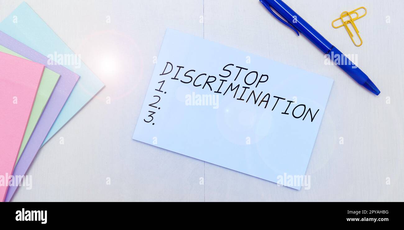 Hand writing sign Stop Discrimination. Conceptual photo Prevent Illegal ...