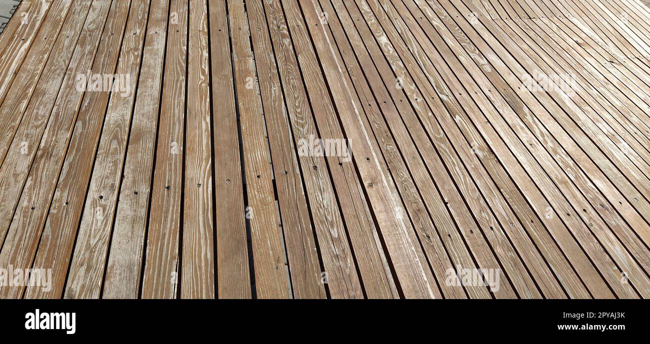 Beautiful smooth unpainted hammered boards. Wooden surface with cracks ...