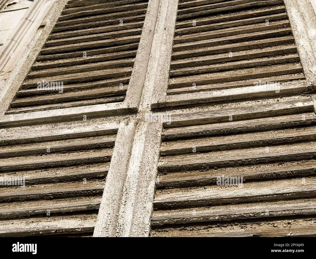 Old wooden shutters on the window. Antique wooden architecture. Dry ...