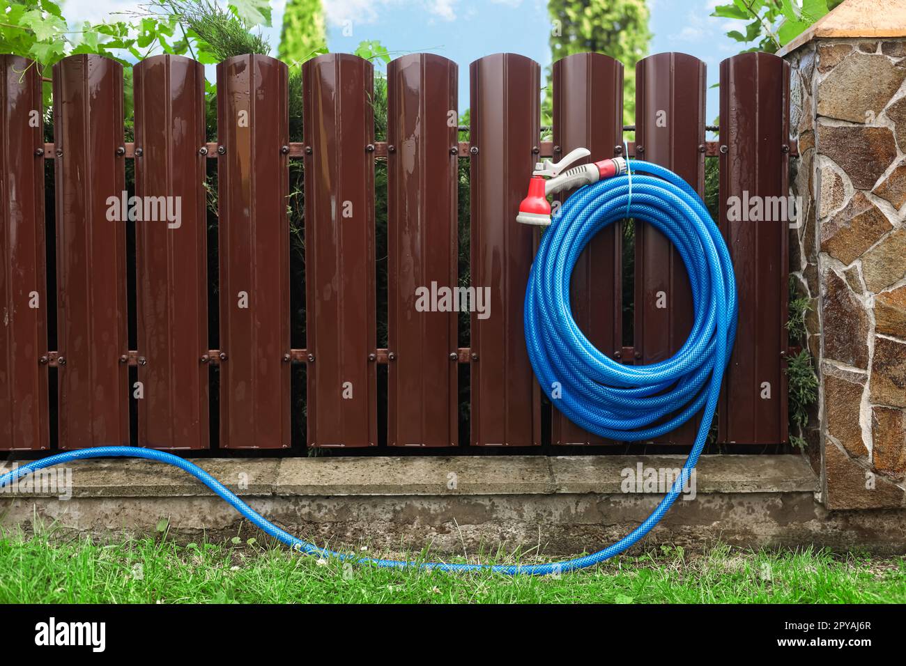 Hanging hosepipe hi-res stock photography and images - Alamy