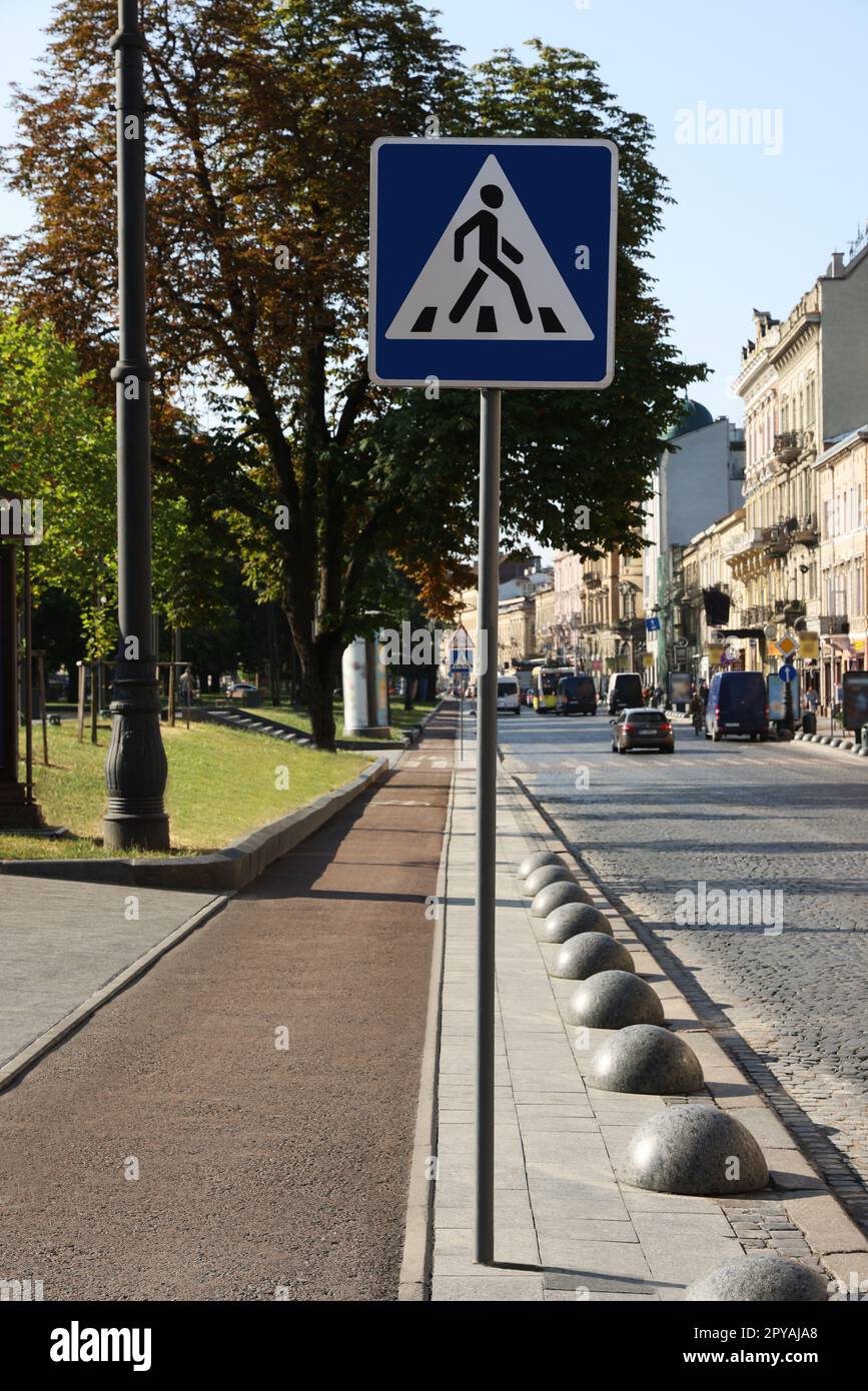 Traffic sign Pedestrian Crossing on city street Stock Photo - Alamy