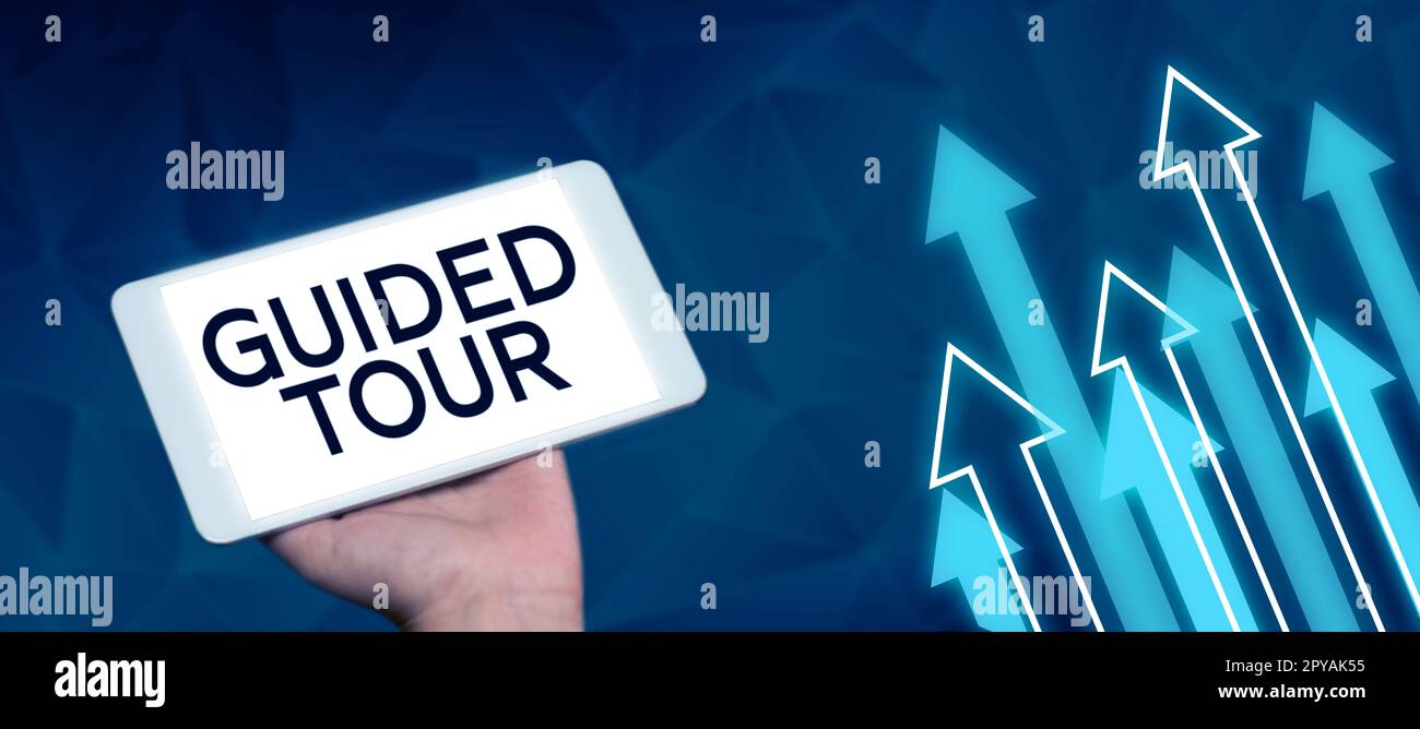 Sign displaying Guided Tour. Word for advice or information aimed at ...