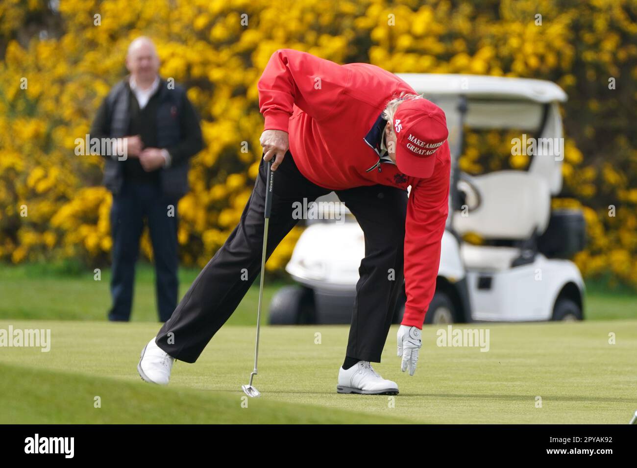 Former US president Donald Trump playing golf at his Trump Turnberry ...