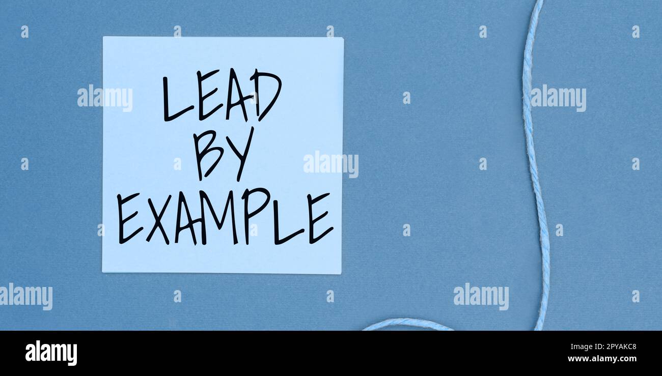 Writing displaying text Lead By Example. Business overview Be a mentor ...