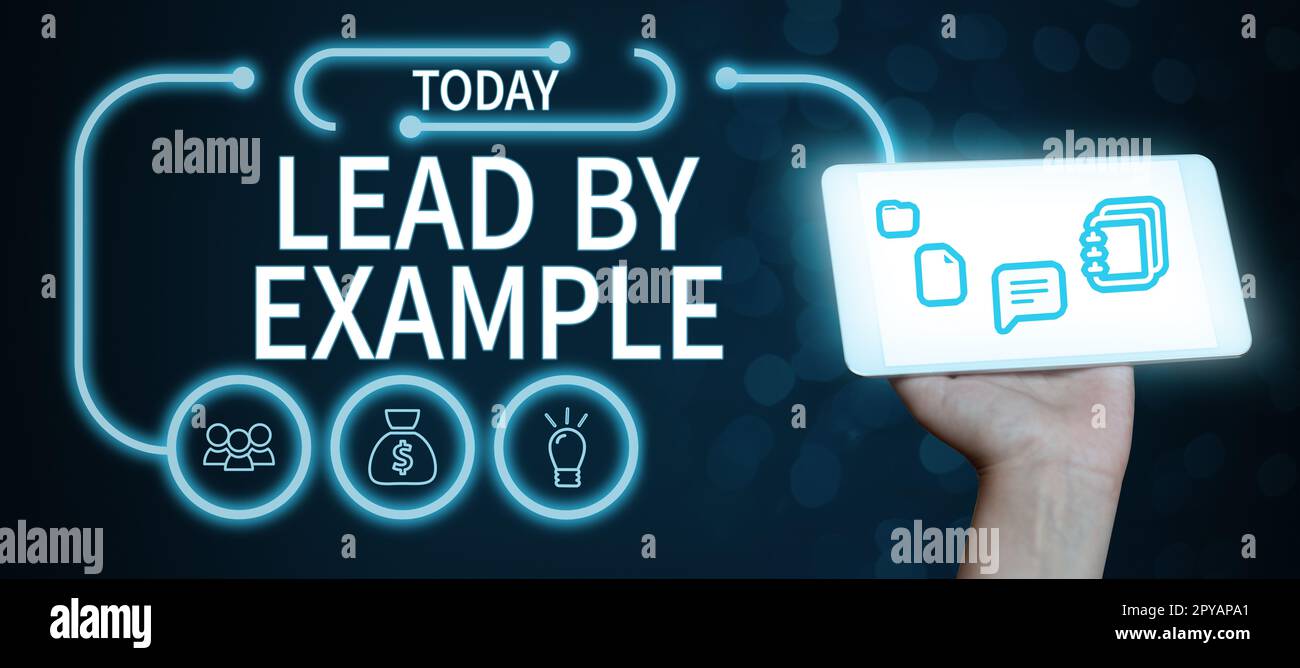 Hand writing sign Lead By Example. Business showcase Be a mentor leader ...