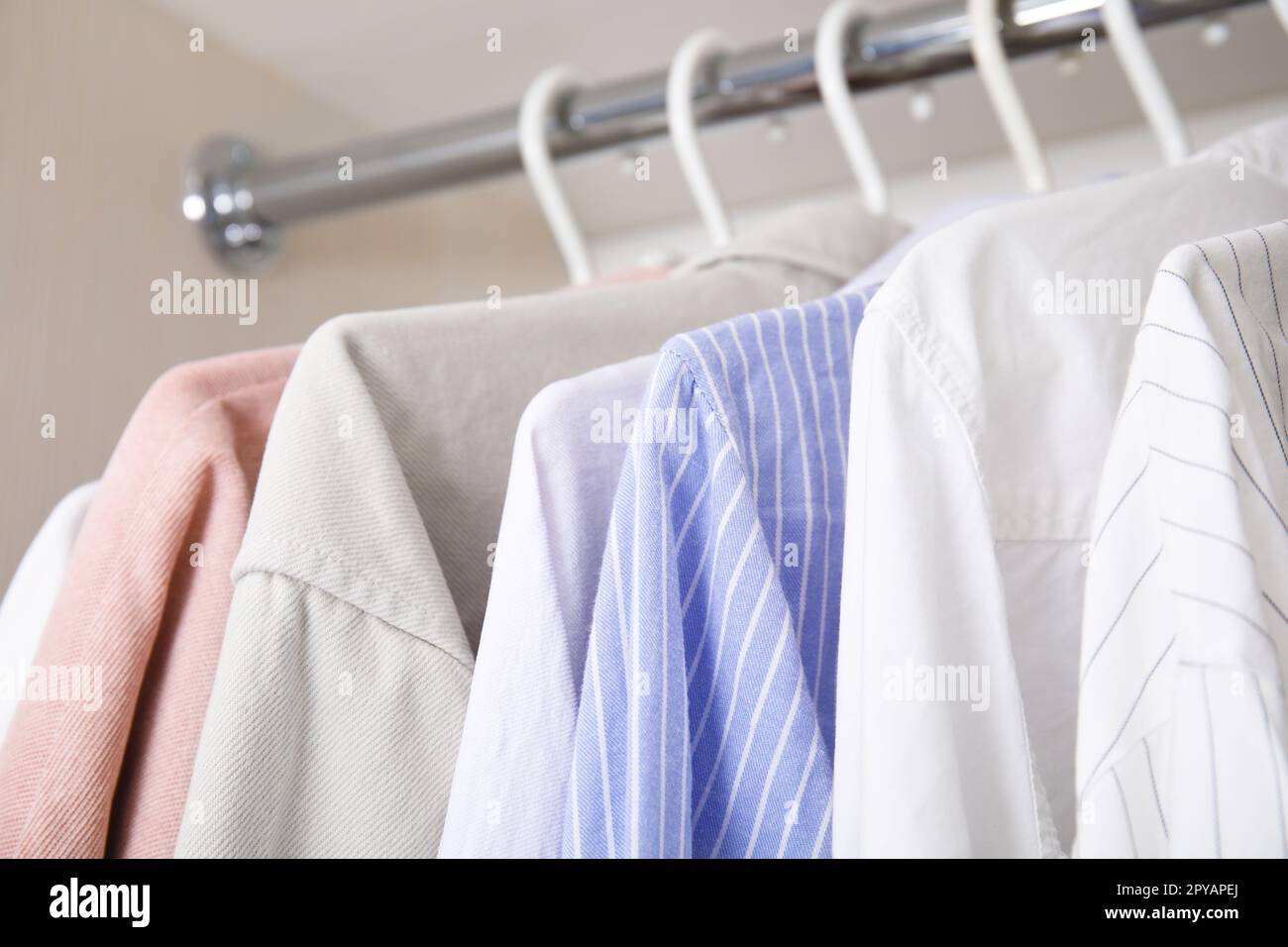 Collection of clothes in wardrobe, closeup view Stock Photo - Alamy