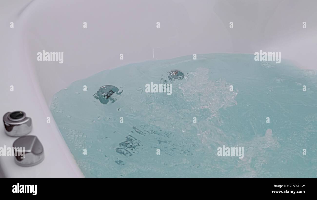 Water running from jets and bubbling in hot tub Stock Photo - Alamy