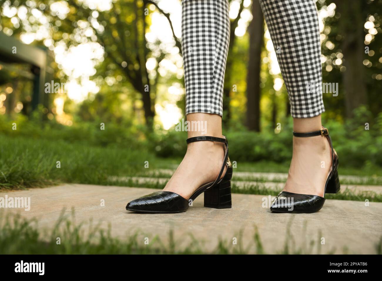Closeup feet walking sidewalk hi-res stock photography and images - Alamy