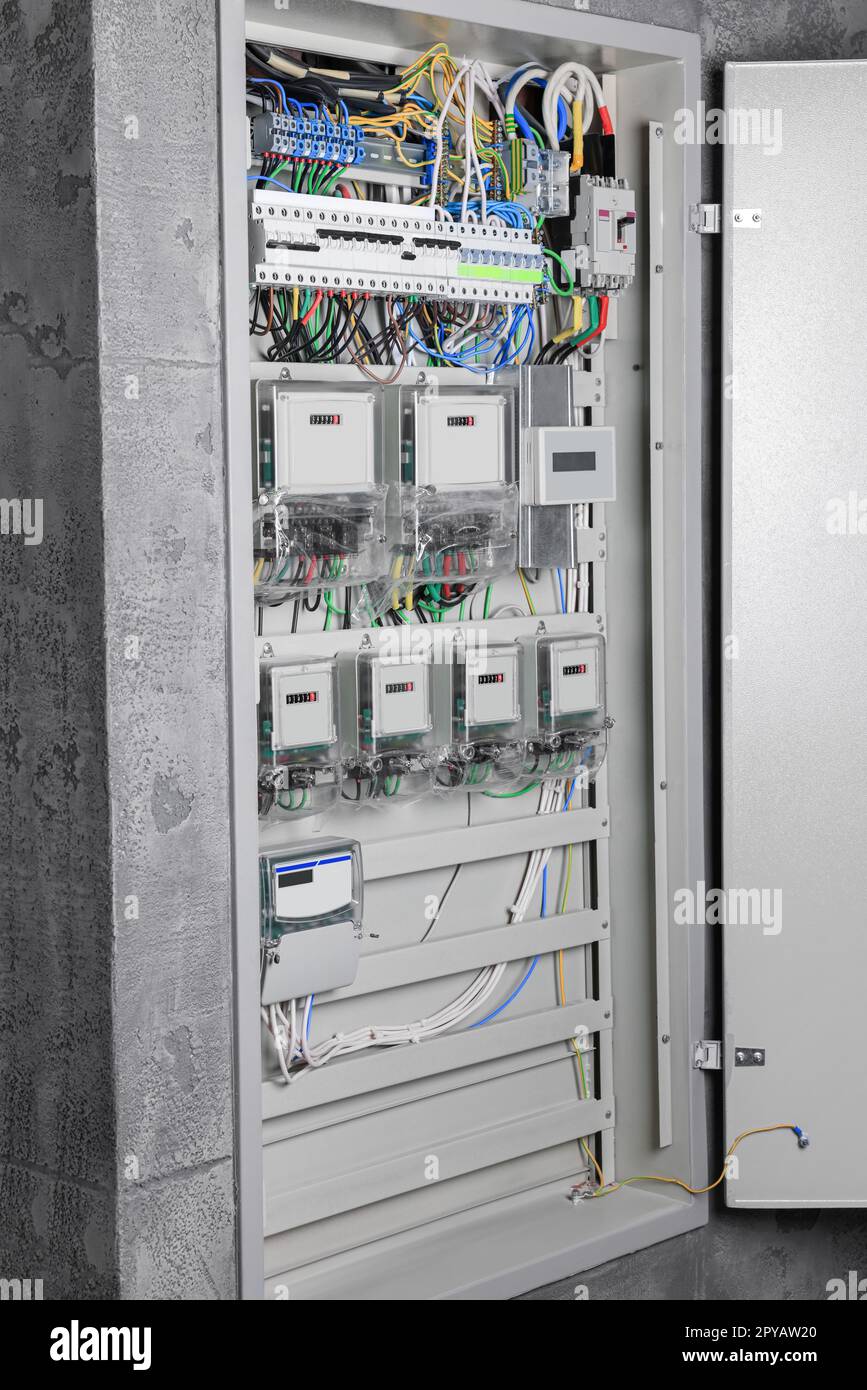 Fuse box with many electric meters and wires Stock Photo - Alamy