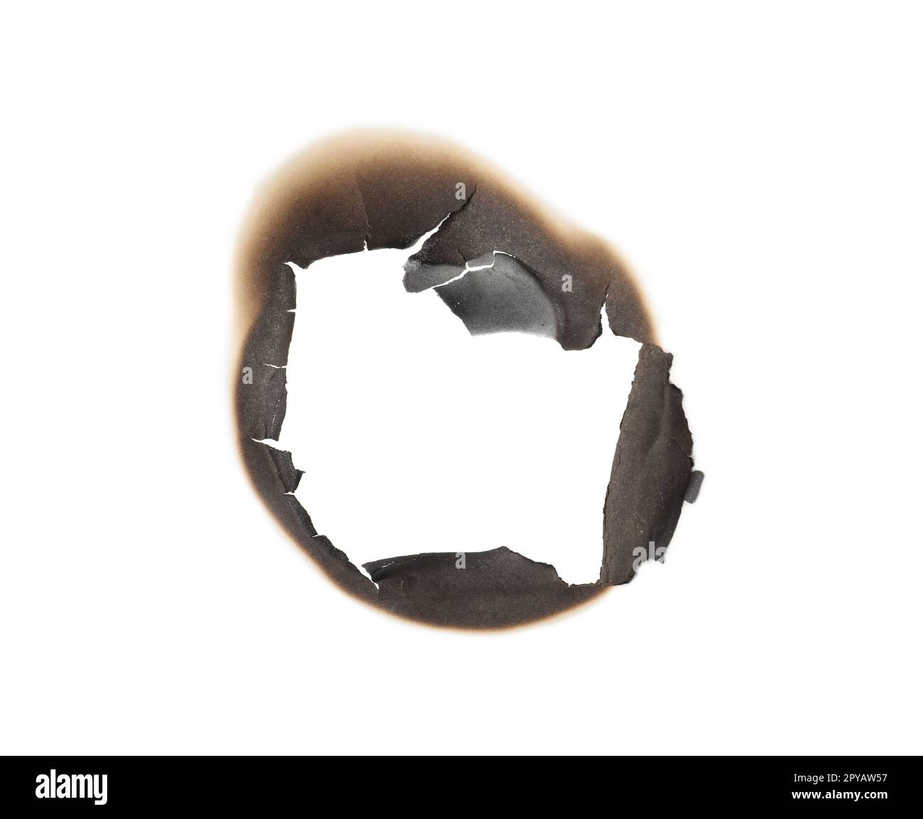 Burnt hole in paper on white background Stock Photo - Alamy