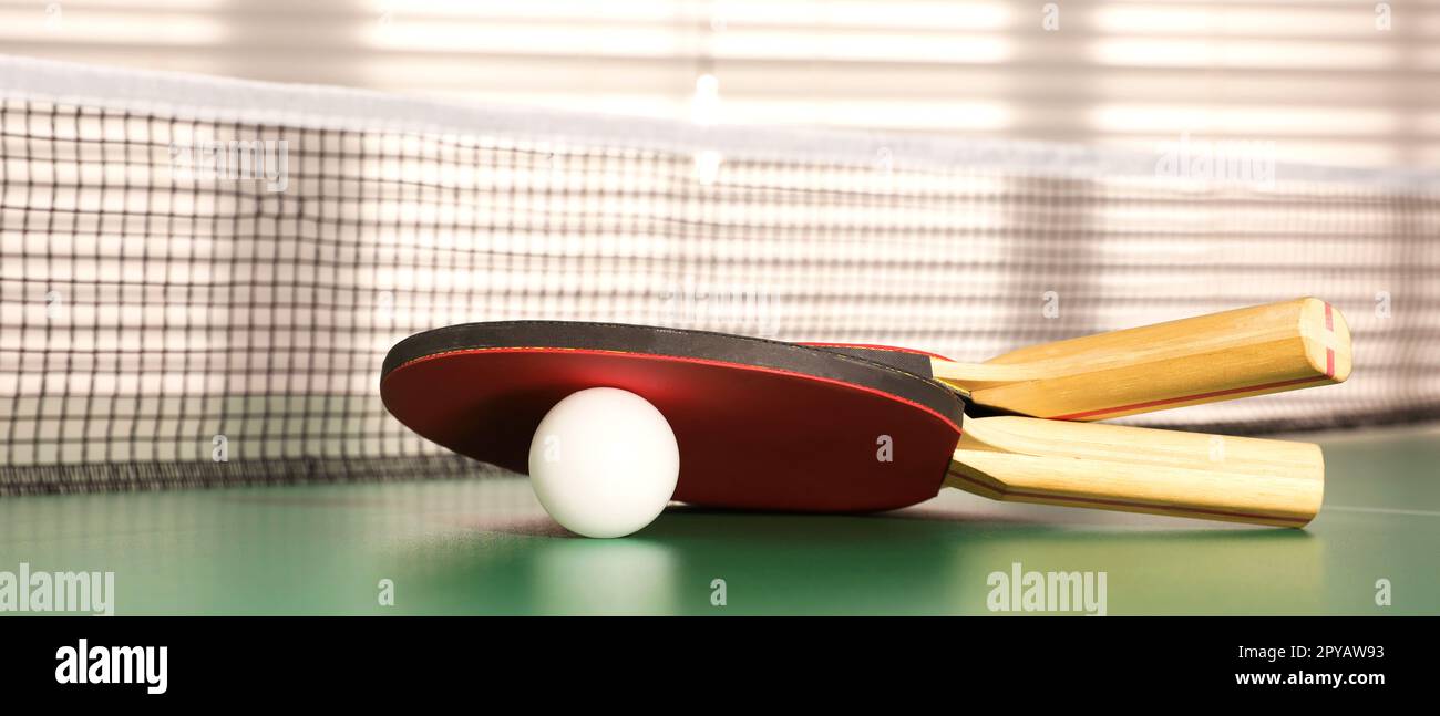 Rackets and ball on ping pong table indoors. Banner design Stock Photo ...