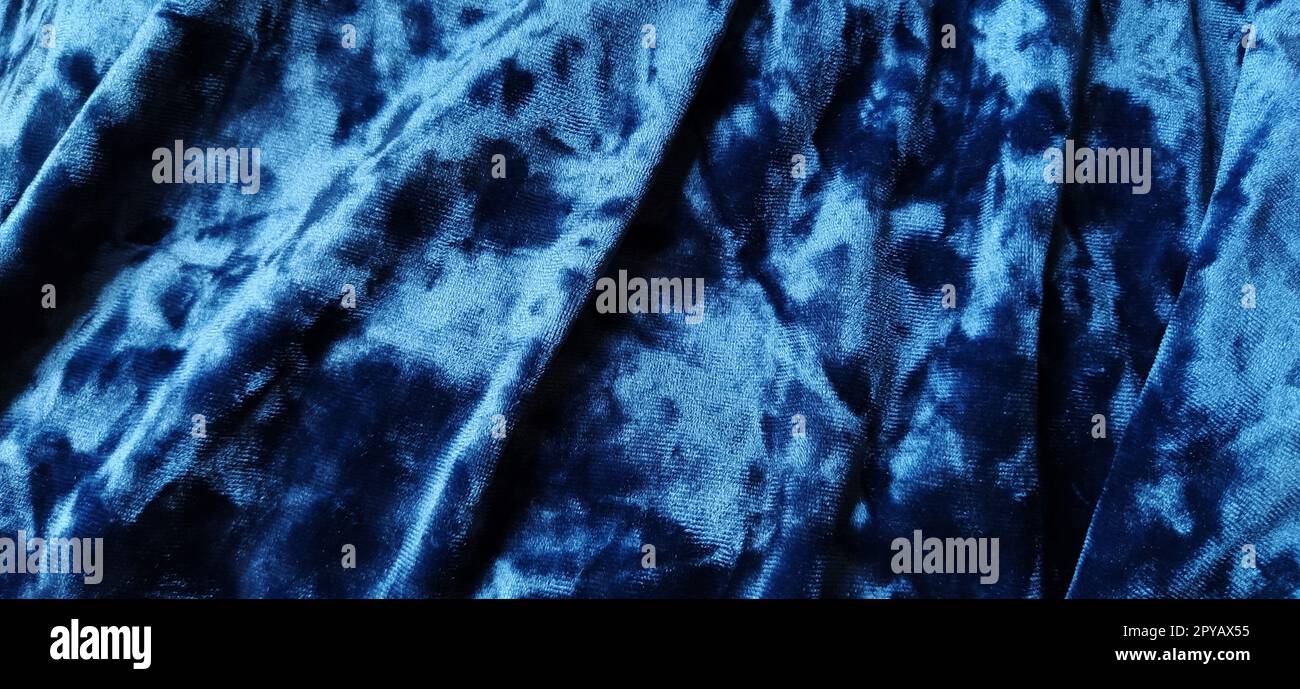 Velvet velor cloth background with glowing light and dark shadows ...