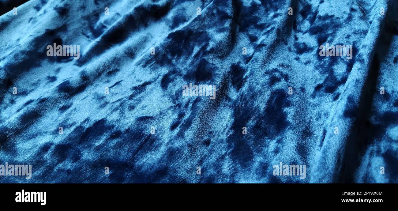 Velvet velor cloth background with glowing light and dark shadows ...