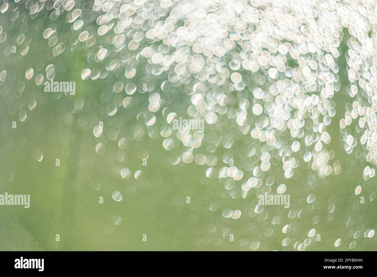 Creative background image, light transparent drops of water in blur ...
