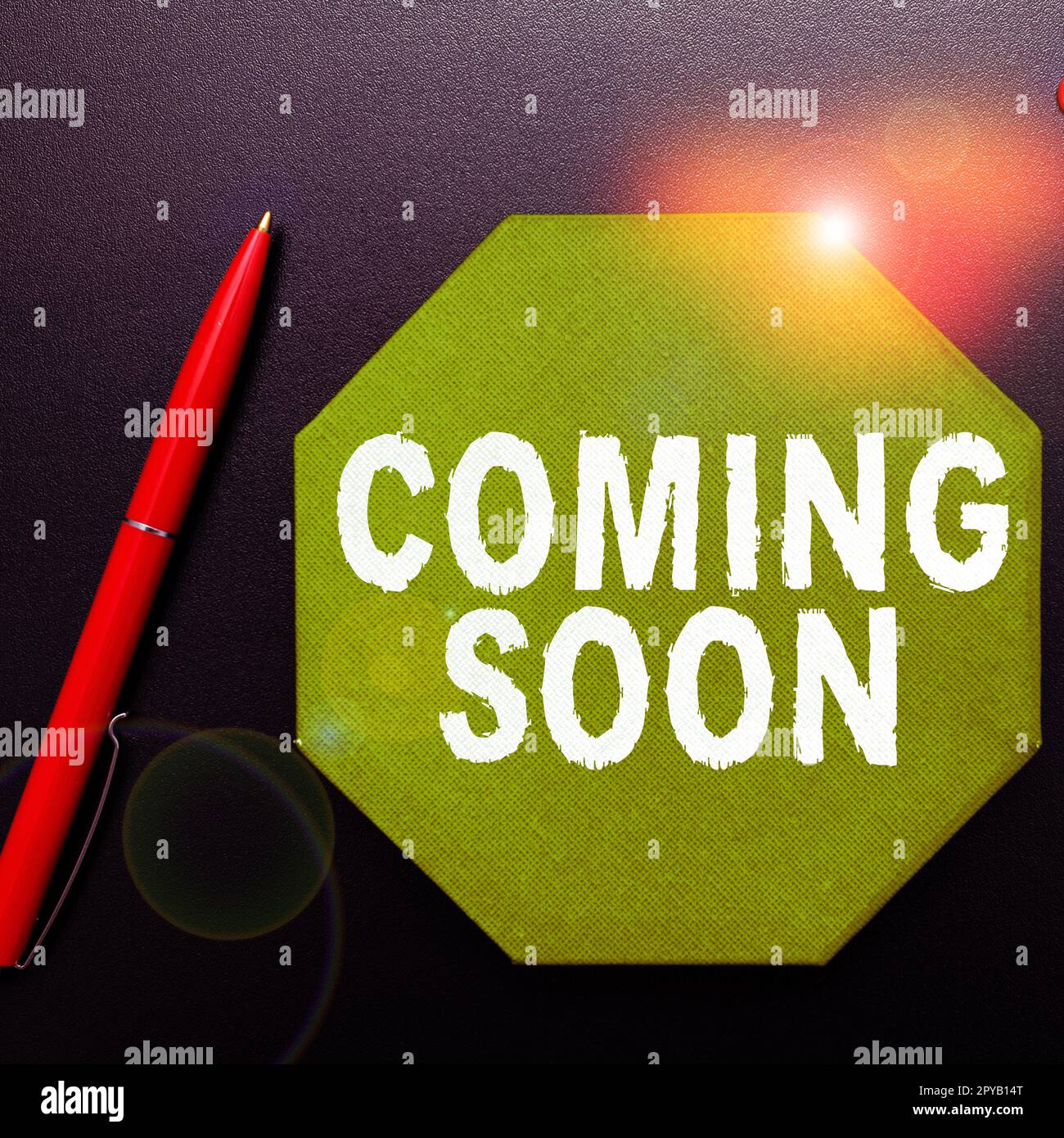 Hand writing sign Coming Soon. Business idea something is going to ...