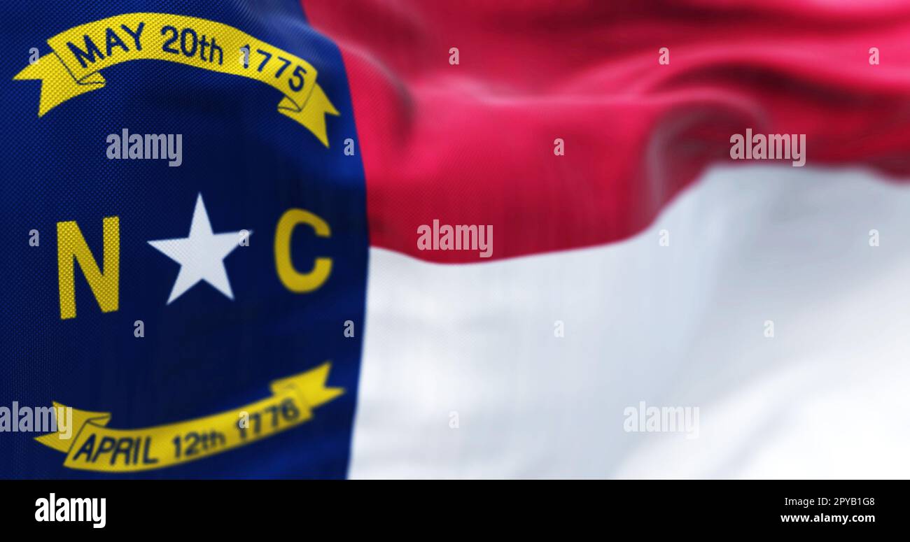North Carolina state flag waving. North Carolina is a state in the ...