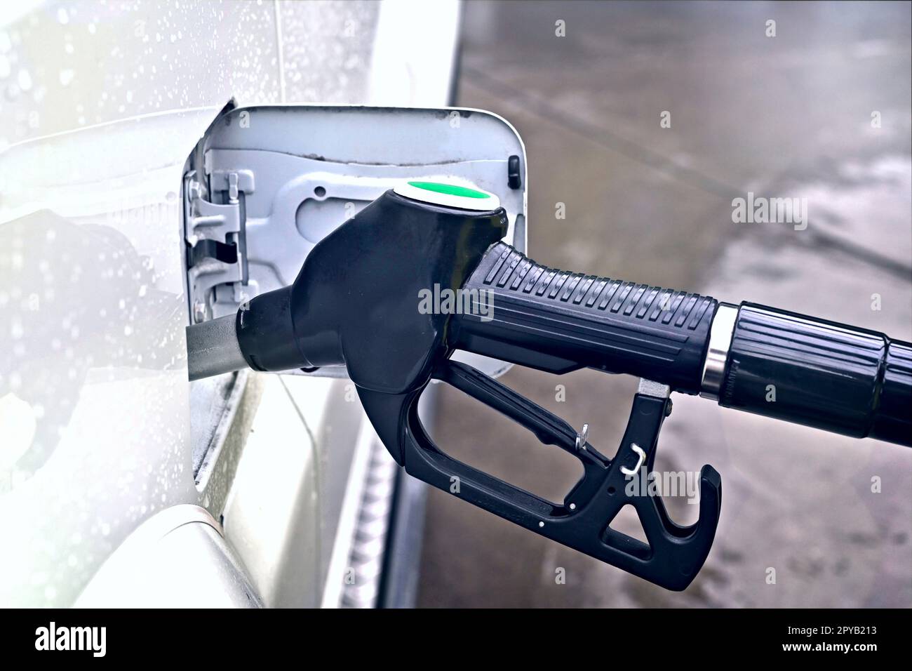 Refilling an car with fuel at the gas station Stock Photo - Alamy