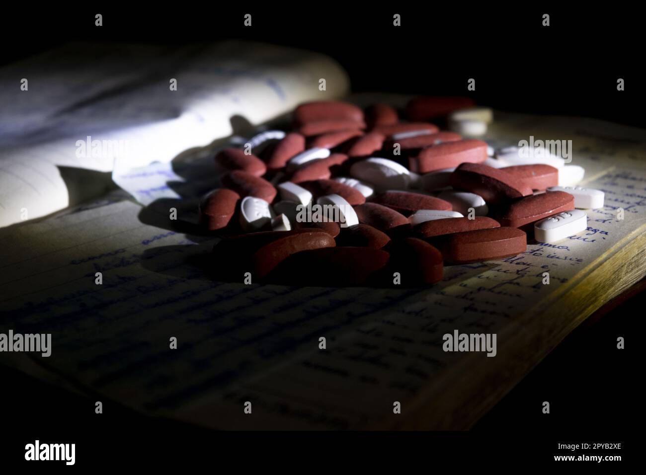 pills on a hand written diary Stock Photo - Alamy
