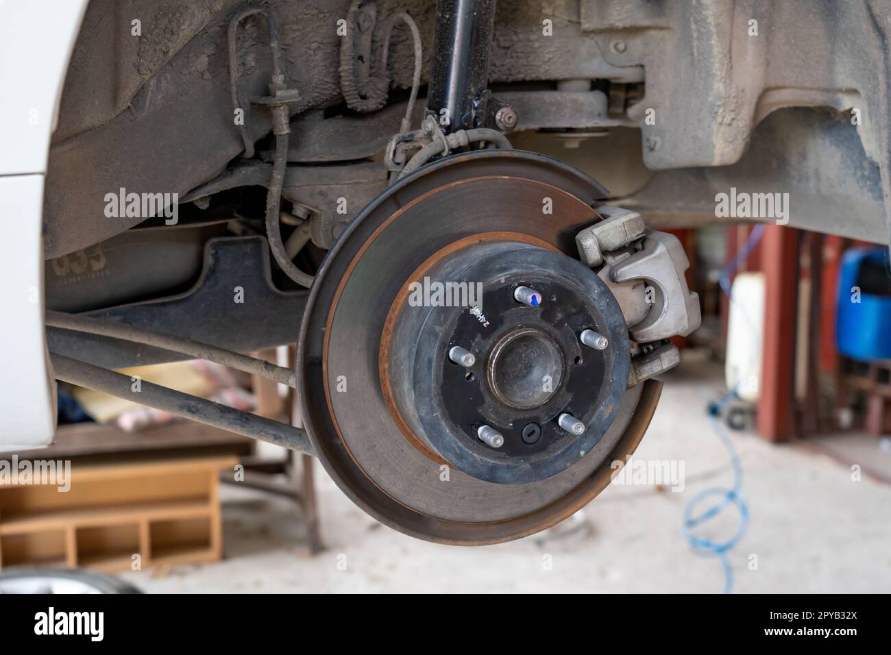 Car front disc break being checked and inspected for safety Stock Photo ...