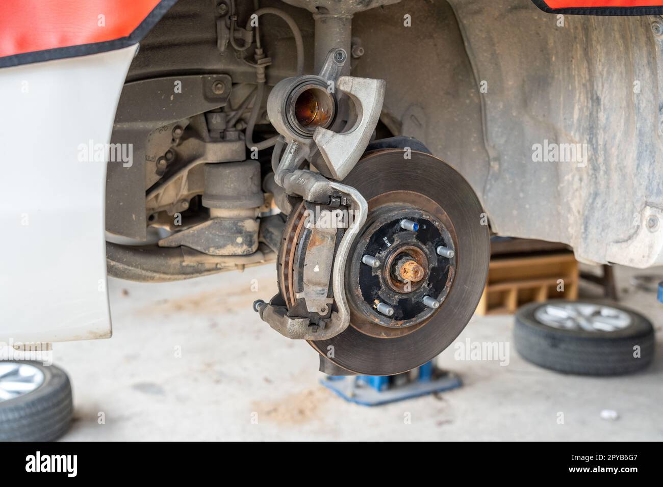 Car front disc break being checked and inspected for safety Stock Photo ...