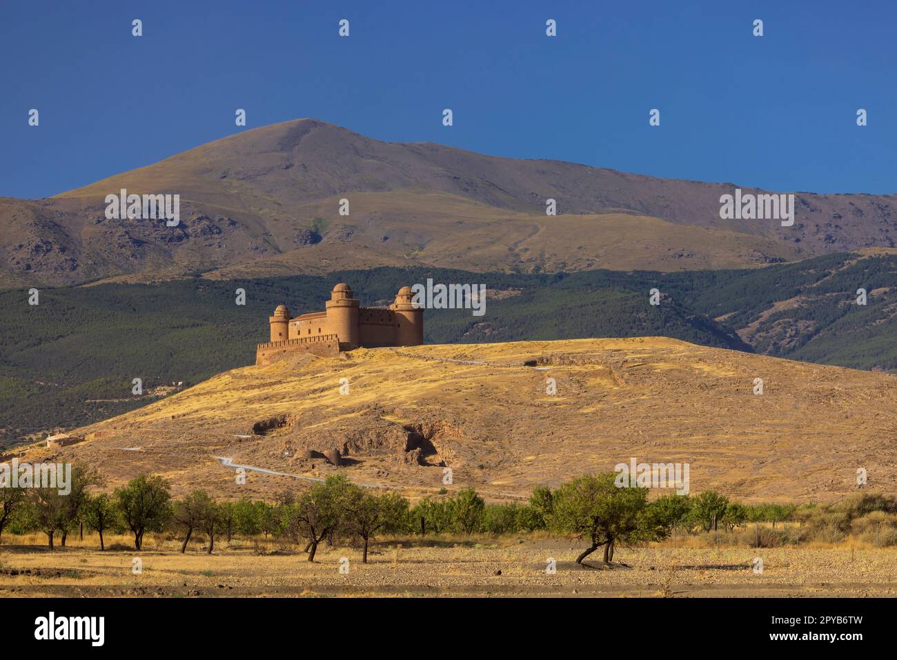 La Calahorra castle with Sierra Nevada, Andalusia, Spain Stock Photo ...