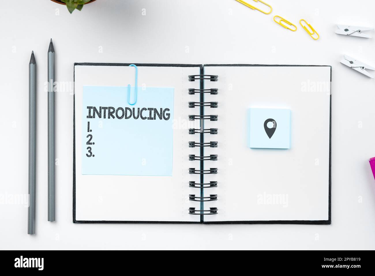 Introducing hand hi-res stock photography and images - Alamy