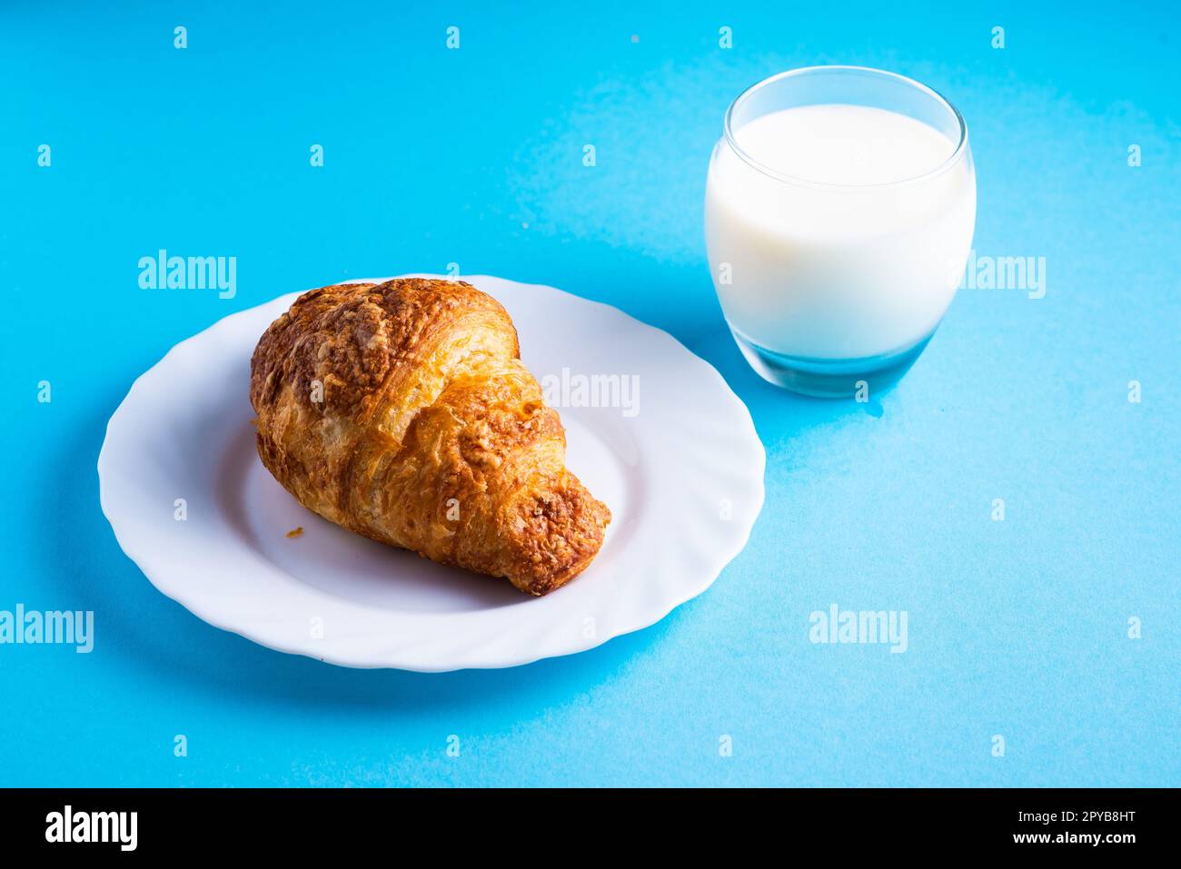 Wheat bread breakfast and milk in morning, croissant, plate Stock Photo ...