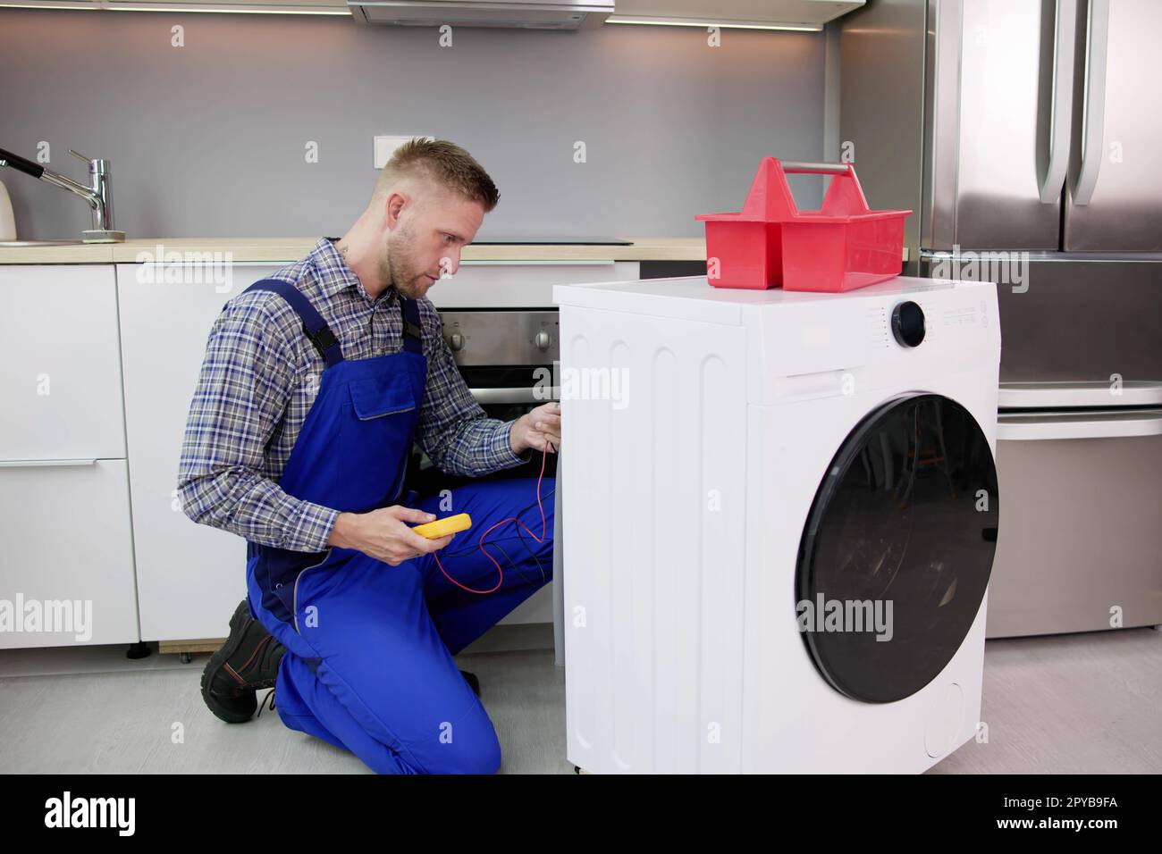 Washing Machine Repair Problem Stock Photo - Alamy