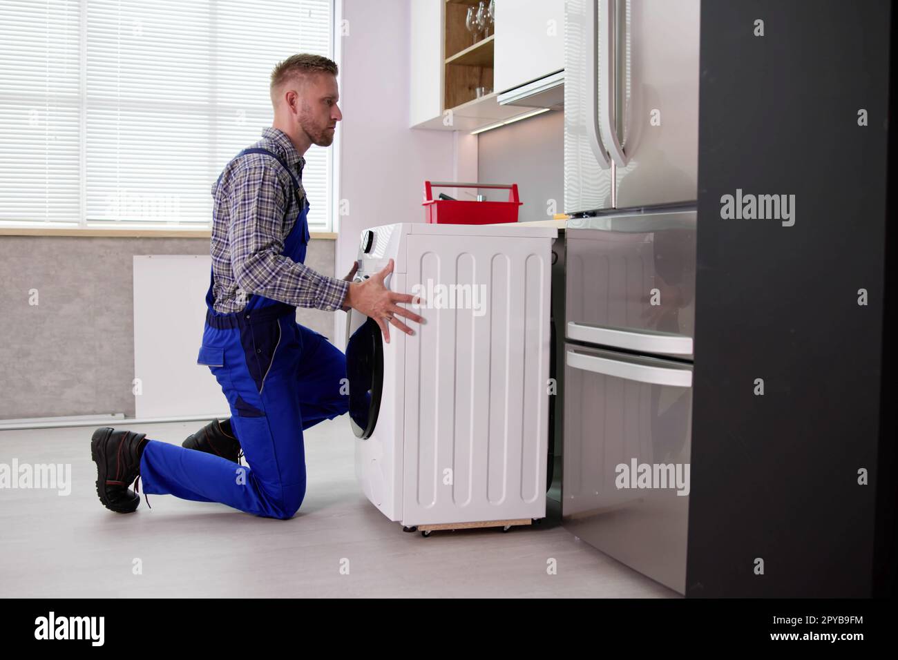 Washing machine fix hi-res stock photography and images - Alamy
