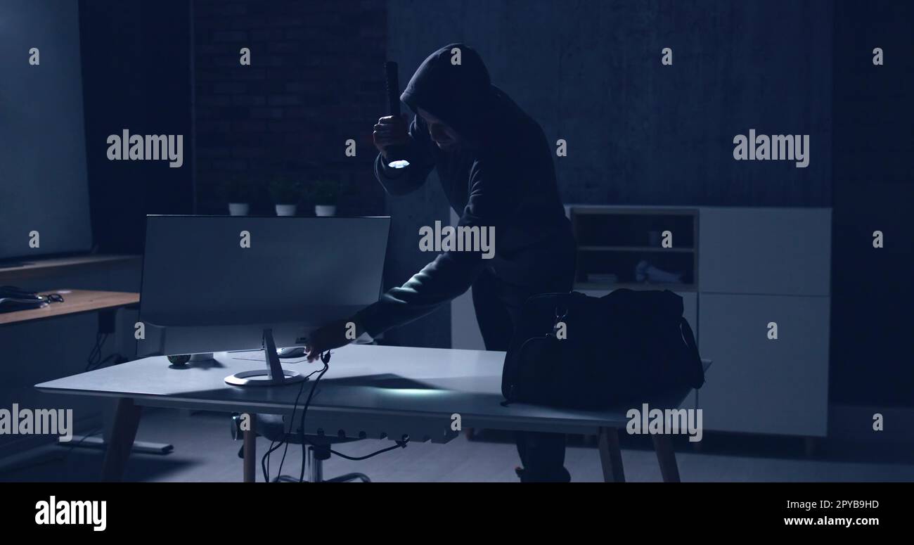 Thief stealing laptop from hi-res stock photography and images - Alamy