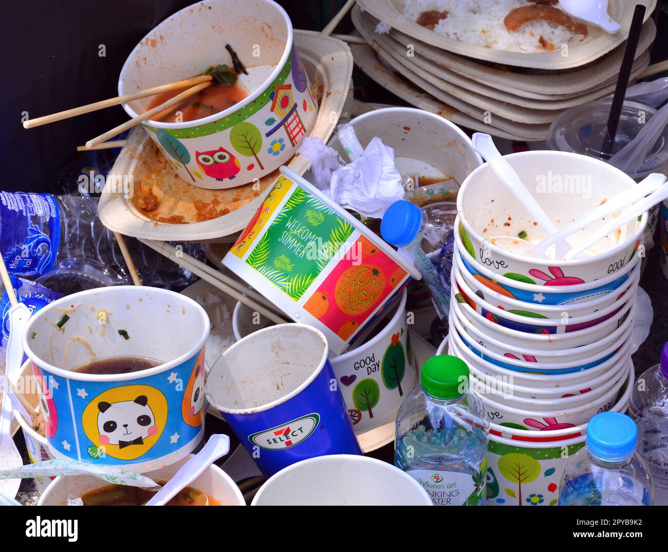 Many food containers rubbish remnants wait to be cleaned away after an ...