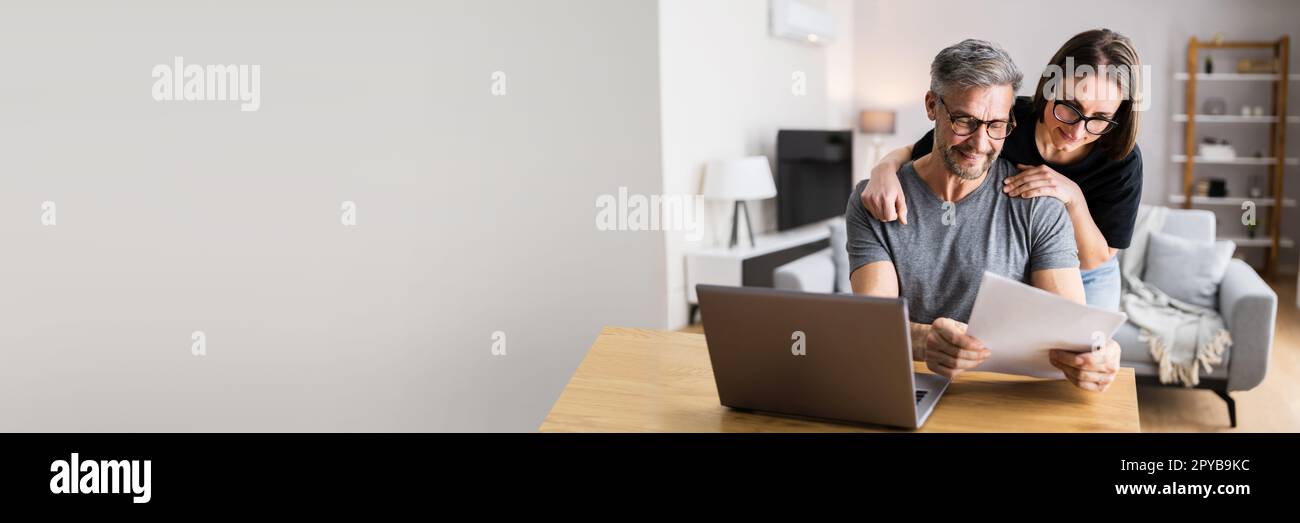 Couple Doing Taxes And Family Budget Stock Photo - Alamy