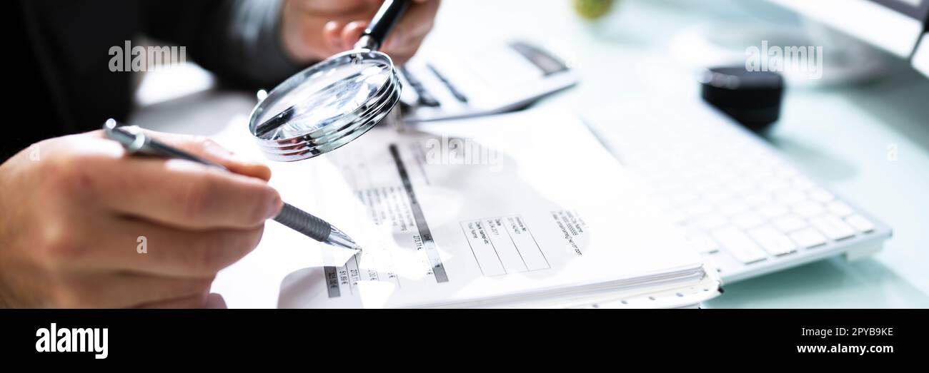 Audit And Fraud Investigation. Auditor Using Magnifying Glass Stock ...